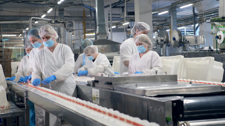 fish food production unit female employees Stock Footage Video (100% ...