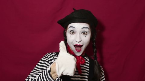 Beautiful Girl Mime Smiles Shows Thumb Stock Footage Video (100% ...