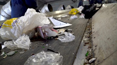 trash spilling out overfilled plastic bag Stock Footage Video (100% ...