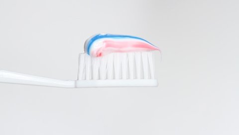 Putting Toothpaste On Brush On Blue Stock Footage Video (100% Royalty ...