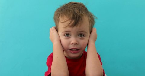 Scared Boy Covering Ears Hands Looking Stock Footage Video (100% ...