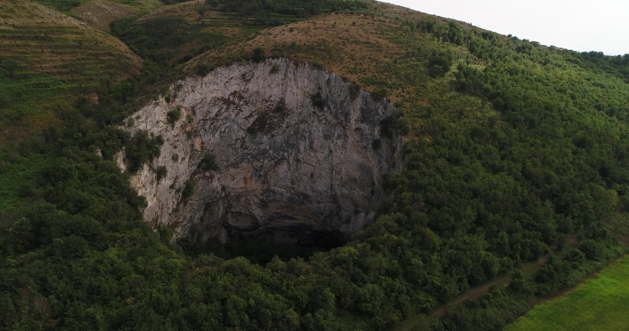 Cave in the Rocks with trees on top image - Free stock photo - Public ...