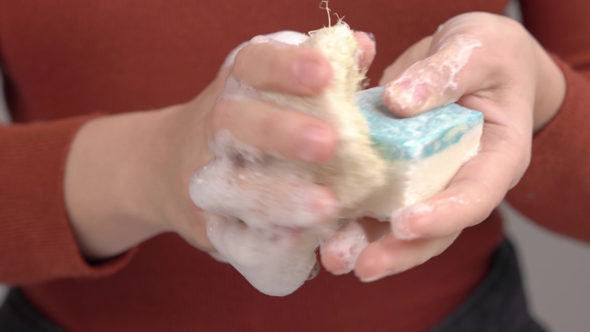 close-up demonstration video woman holding sponge Stock Footage Video ...