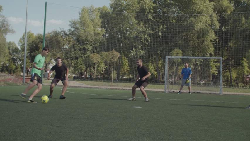 positive street football players playing soccer Stock Footage Video ...
