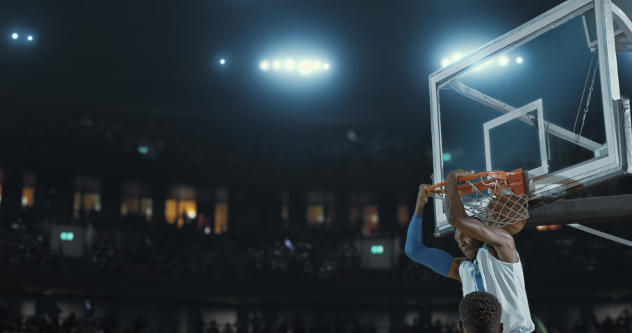 basketball player scores goal on professional Stock Footage Video (100% ...