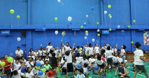 Badminton Players Hitting Balloons Sports Hall Stock Footage Video (100 ...