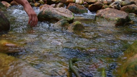 Hand Dipping Fresh Clear Running Stream Stock Footage Video (100% ...