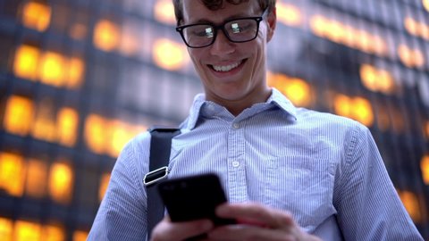 Serious Casual Man Holding Mobile Phone Stock Photo 1256430022 ...