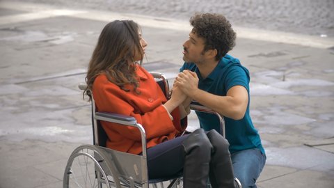 Handicaploveromanceyoung Woman On Wheelchair Flirting Attractive Stock ...