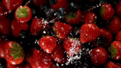 exploding cherry tomatoes water on black Stock Footage Video (100% ...