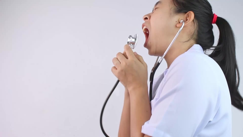 Young Female Doctor Singing with Stock Footage Video (100% Royalty-free ...