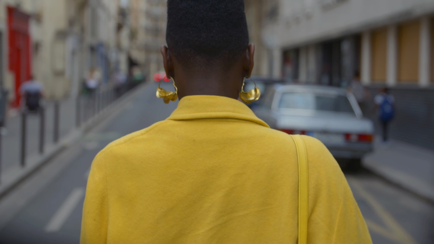 Woman walking looking over shoulder Stock Video Footage - 4K and HD ...