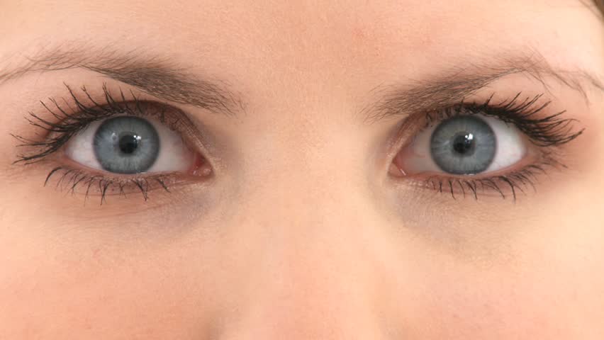 young woman looks up batting eyelashes Stock Footage Video (100% ...