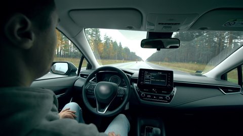 Person Sits Car On Autopilot Driving Stock Footage Video (100% Royalty ...