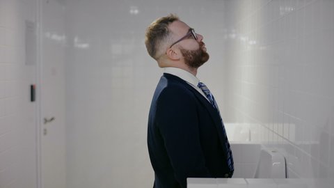 man running toilet bowl peeing Stock Footage Video (100% Royalty-free ...