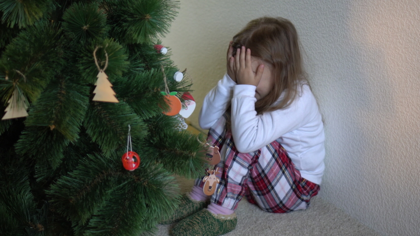crying child by christmas tree baby Stock Footage Video (100% Royalty ...