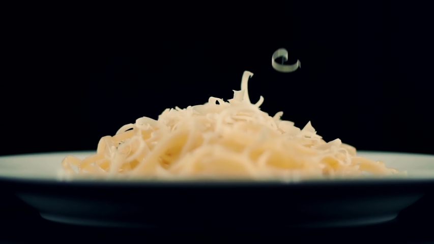 chef grating pecorino cheese on spaghetti Stock Footage Video (100% ...