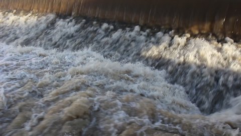 Gusting Water Under Weir Sunlight Highliting Stock Footage Video (100% ...