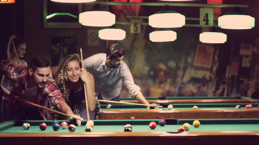 happy young people enjoying billiard game Stock Footage Video (100% ...