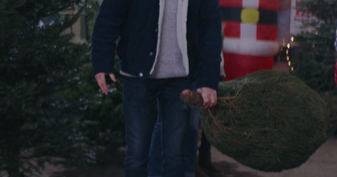 Caucasian Family Bringing Packed Christmas Tree Stock Footage Video ...