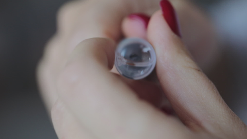 girl hand holding injection bottle shaking Stock Footage Video (100% ...