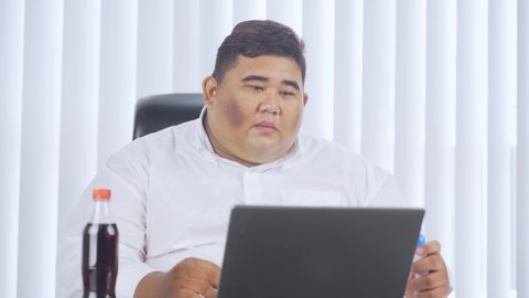 Fat man eating candy Stock Video Footage - 4K and HD Video Clips ...