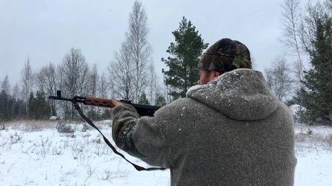 Man Shooting Rifle Winter Shooter Carbine Stock Footage Video (100% ...