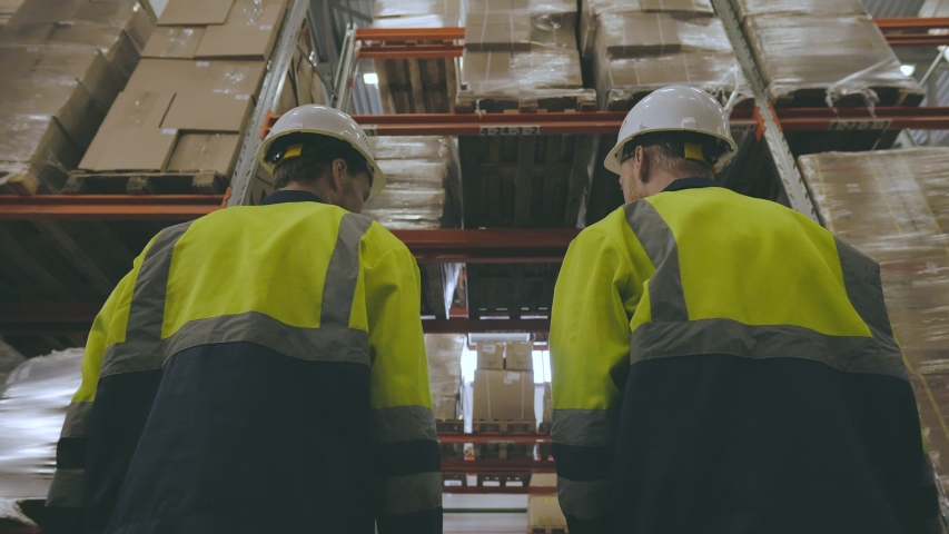 low angle back view warehouse team Stock Footage Video (100% Royalty ...
