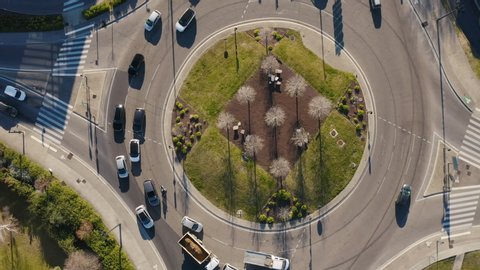 Busy Roundabout Trees Traffic Cars Trucks Stock Footage Video (100% ...