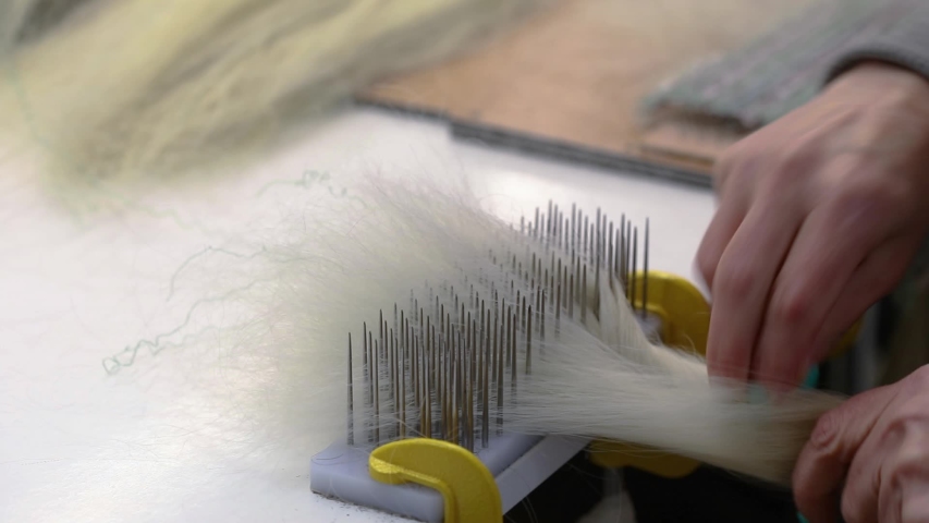 wig production combing hair process Stock Footage Video (100% Royalty ...