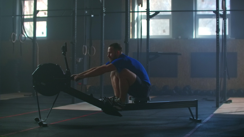 fitness man athlete training rowing machine Stock Footage Video (100% ...