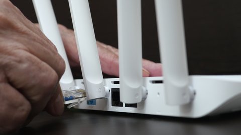 Man Hand Plugging Blue Internet Cable Stock Footage Video (100% Royalty ...