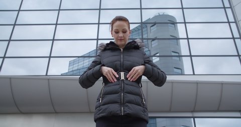 671 Woman taking off jacket Stock Video Footage - 4K and HD Video Clips ...