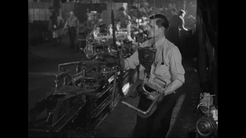 circa 1930s - factory workers hoist Stock Footage Video (100% Royalty ...