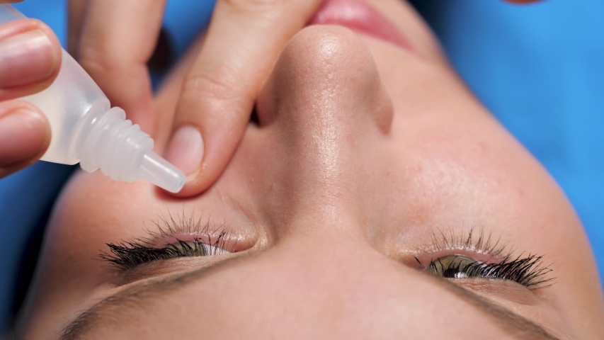 Attractive Girl Dripping Eye Drops Introduces Stock Footage Video (100% ...