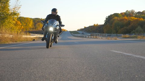 Motorcycle riding front view Stock Video Footage - 4K and HD Video ...