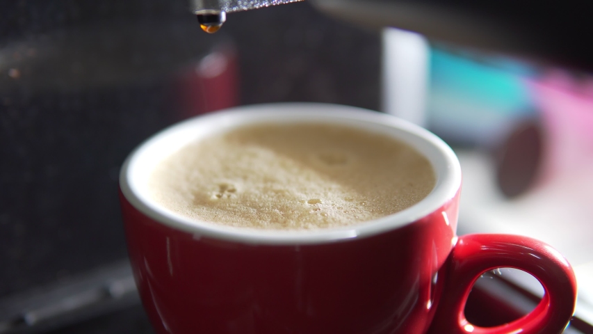 Footage B Roll of Pouring coffee stream from machine in cup. Home ...