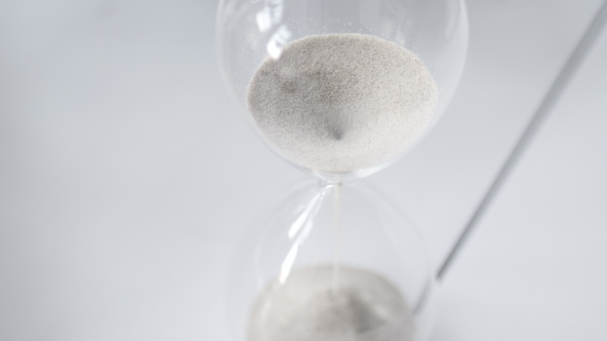 hourglass sand falling slow motion above Stock Footage Video (100% ...