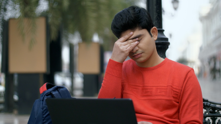 young college student suffering severe headache Stock Footage Video ...