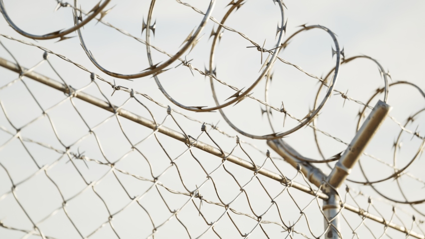 loopable side view jail's outdoor fence Stock Footage Video (100% ...