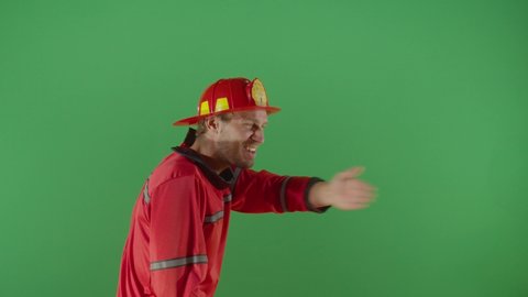 Adult Man Firefighter Backwards Directing People Stock Footage Video ...