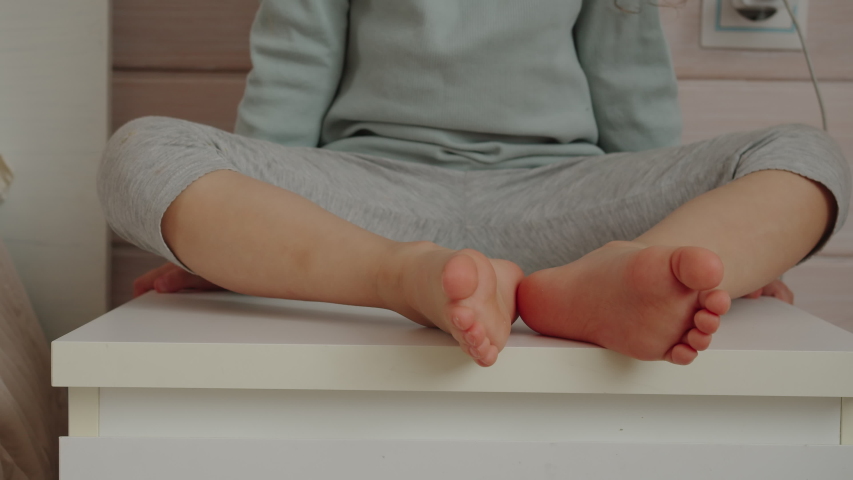 child legs while baby girl sitting Stock Footage Video (100% Royalty ...