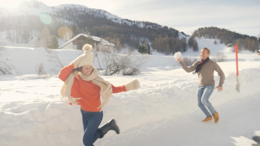 two-people-snowball-fighting-in-the-winter image - Free stock photo ...