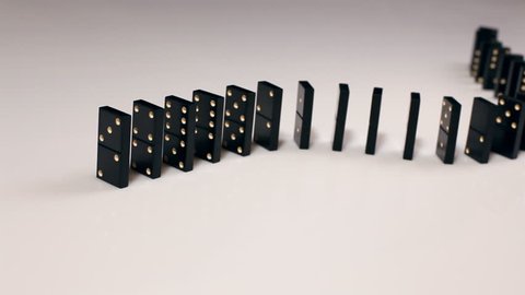 Finger Pushing Dominoes Row Causing Chain Stock Footage Video (100% ...