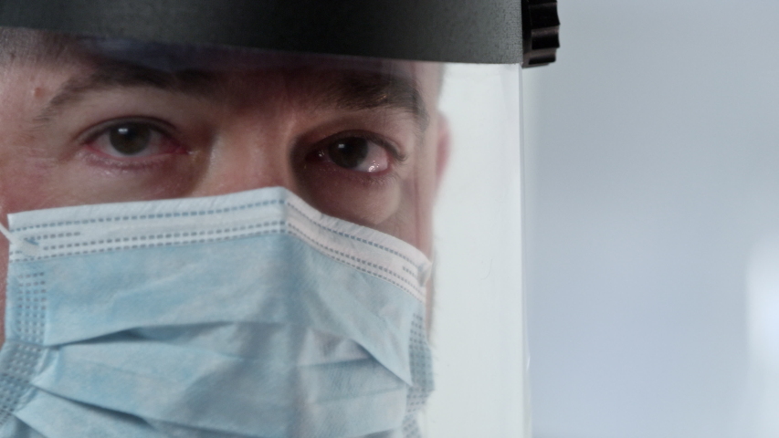 male lab technician wearing face mask Stock Footage Video (100% Royalty ...