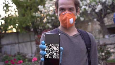 Man Medical Mask Shows Qr Code Stock Footage Video (100% Royalty-free ...