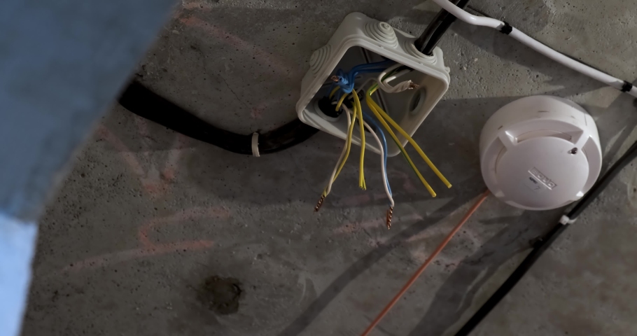 professional electrician works indoors electrical wiring Stock Footage ...