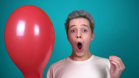 Young Smiling Happy Guy Colored Blue Stock Footage Video (100% Royalty ...