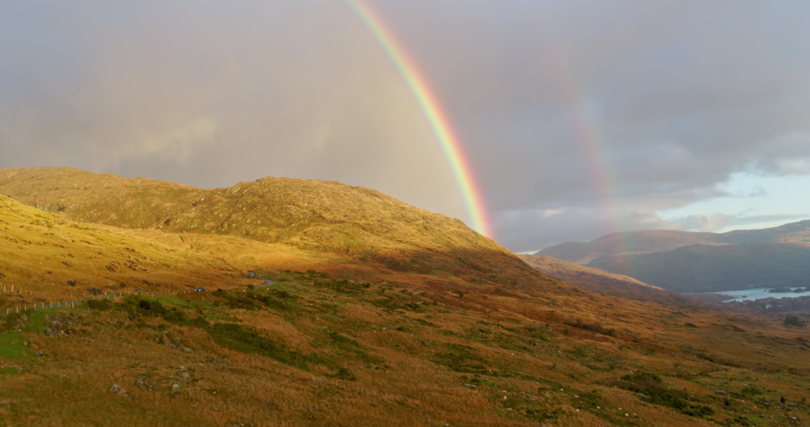 Bright Rainbow in the Hills Stock Footage Video (100% Royalty-free ...