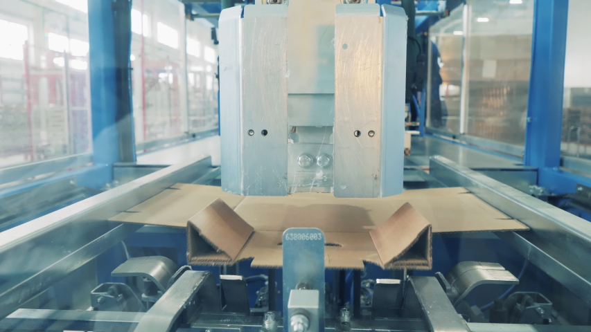 factory press manufacturing carton boxes Stock Footage Video (100% ...